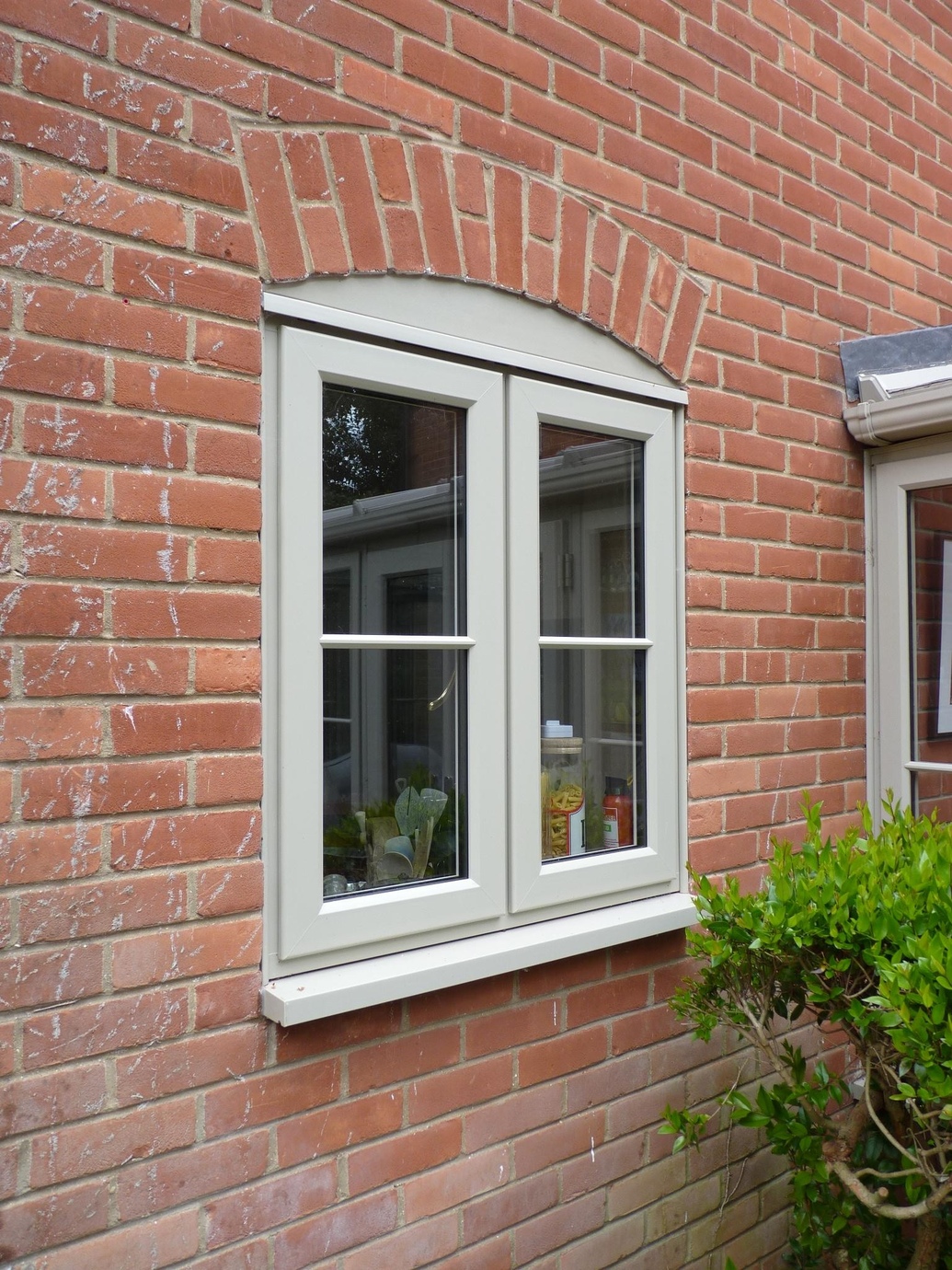 Traditional-style Norfolk cottage windows with authentic bar